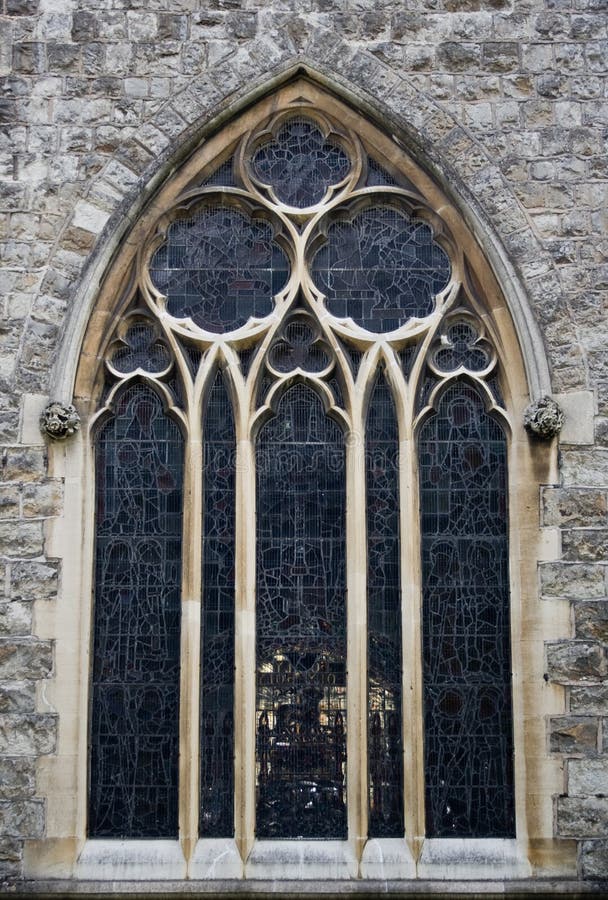 Gothic Stone Faces Next To a Church Window Stock Image - Image of decor ...