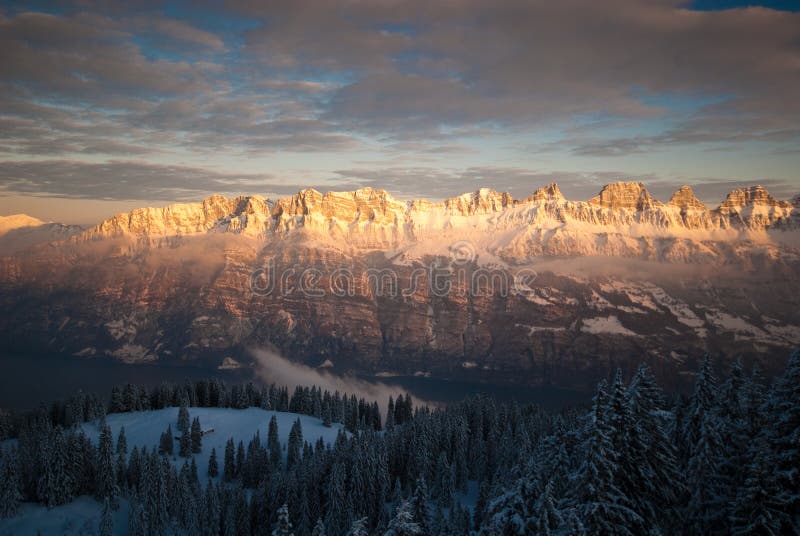 Churfirsten Mountains stock image. Image of sunset, snow - 9938137