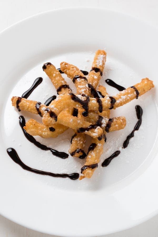 Churros on Plate with Chocolate Stock Image - Image of sugar, churro ...