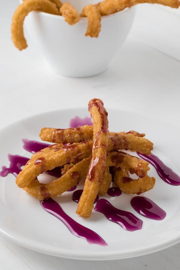 Churros on Plate with Fruit Syrup Stock Image - Image of delicious ...