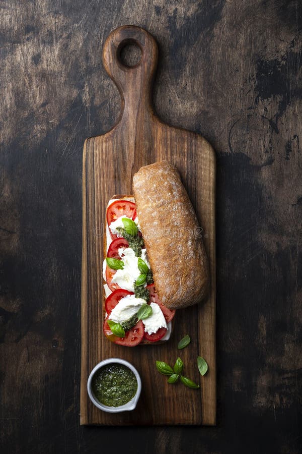 Ciabatta Bread with Mozzarella, Tomatoes and Basil Stock Image - Image ...