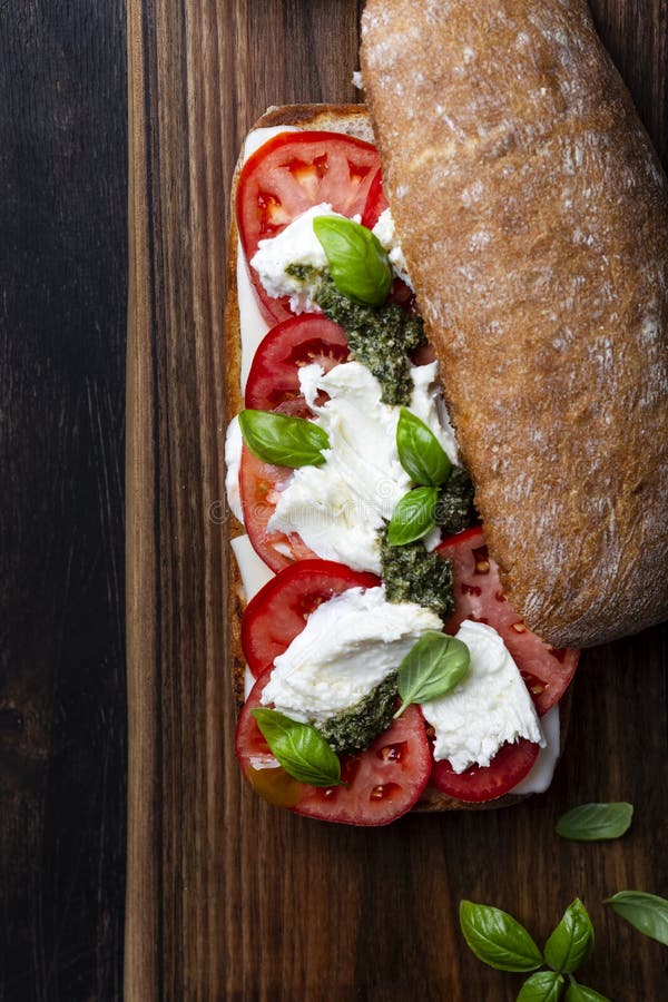 Ciabatta Bread with Mozzarella, Tomatoes and Basil Stock Photo - Image ...