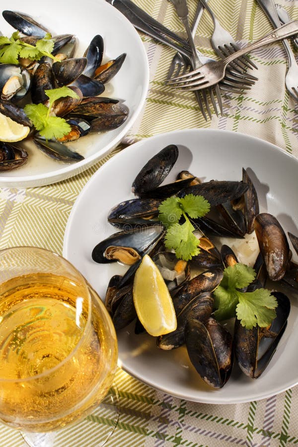 Cider Steamed Mussel with Coriander and Lemon Stock Photo - Image of ...