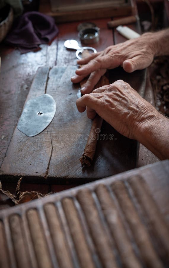 A Cigar Rolling Machine Inside a Cigar Factory. Traditional Manufacture ...