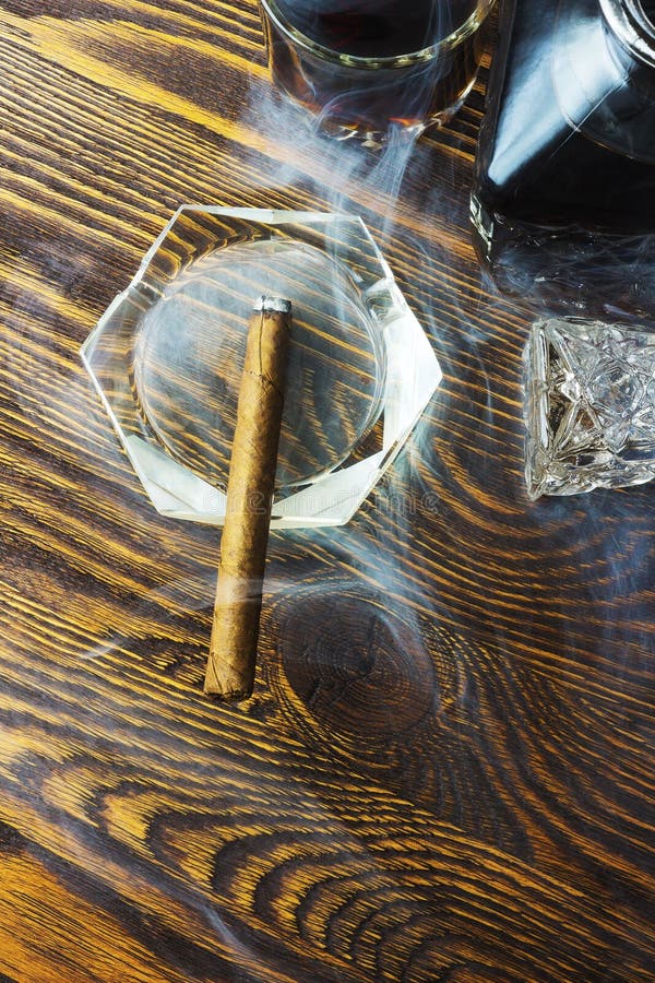 Cigar smoke and alcohol stock image. Image of cigarette - 51448333