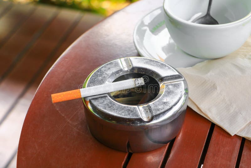 Cigarette in Ashtray Placed on Table Wood Background Stock Photo ...