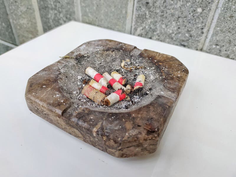 Cigarette Butts in the Ashtray Inside the House Stock Image - Image of ...