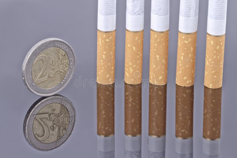 Cigarette and the 2 Euro Coin Stock Image - Image of stop, danger: 42036891