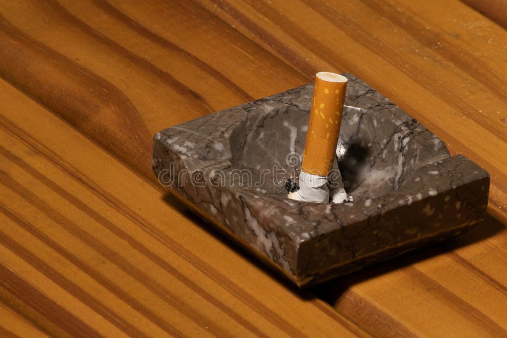 Cigarette Extinguished in Marble Ashtray Stock Image - Image of marble ...