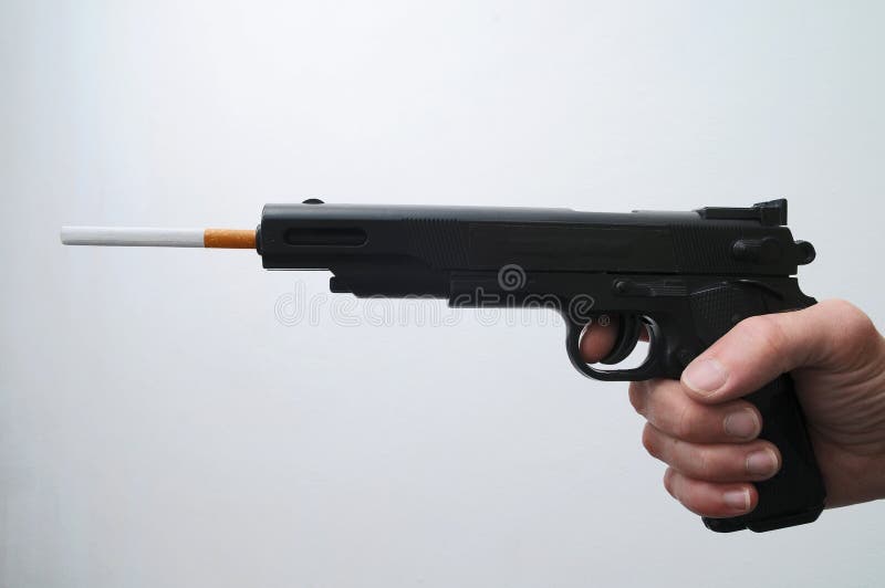 Cigarette and Gun stock photo. Image of black, model - 31927714
