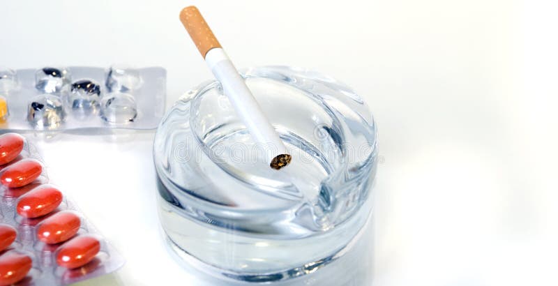 Cigarette and pills stock photo. Image of reflection, pills - 4677630