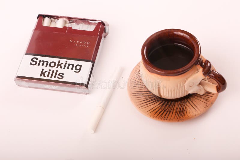 Cigarettes with coffee stock photo. Image of coffee - 118413484