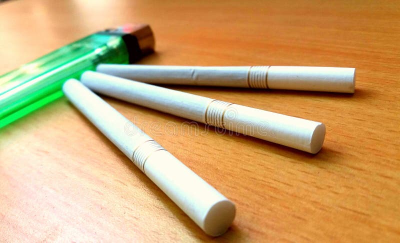 Cigarettes and matches stock photo. Image of flammable - 54869244
