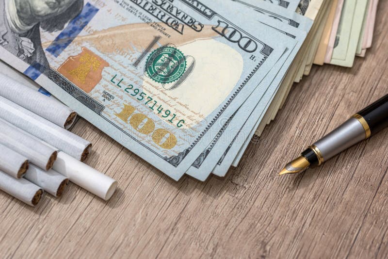 Cigarettes with money stock image. Image of unhealthy - 109281413