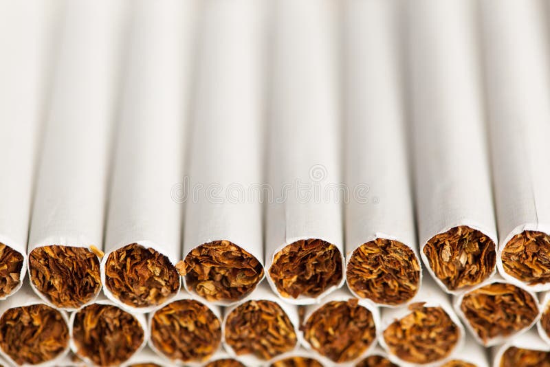 Cigarettes production line stock image. Image of backdrop - 36021661