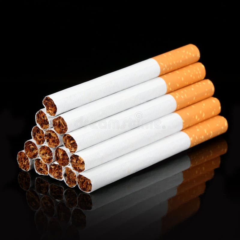 Cigarros Arranjados Em Seguido, Um Fundo Imagem de Stock - Imagem de ...