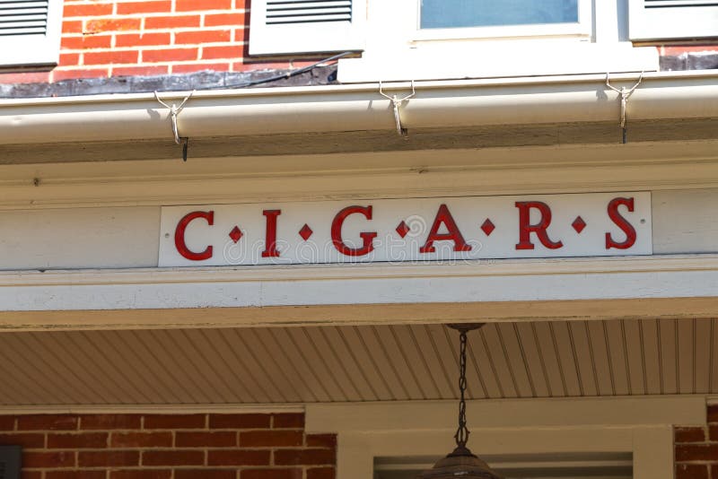 Sign for Cigars Near Hanging Tobacco Leaves Stock Photo - Image of ...