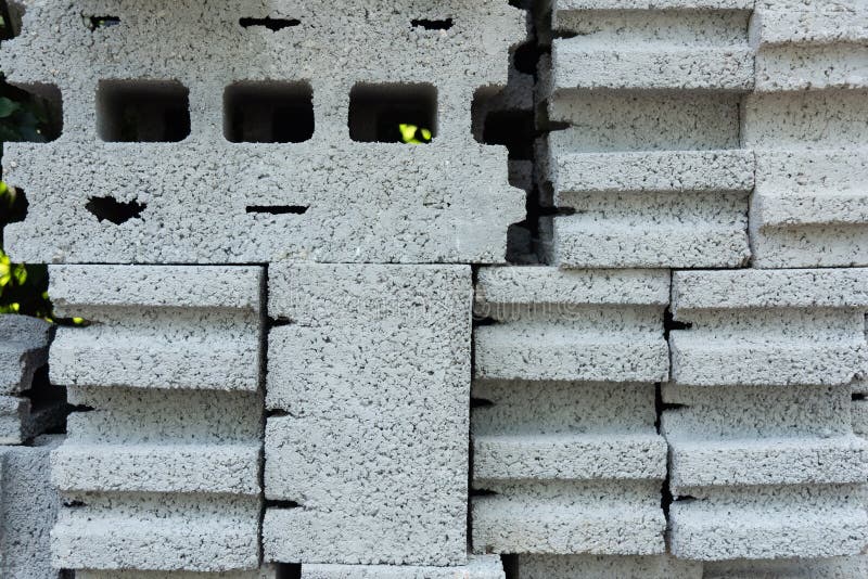 Cinder blocks in a garden stock photo. Image of construction - 340543208