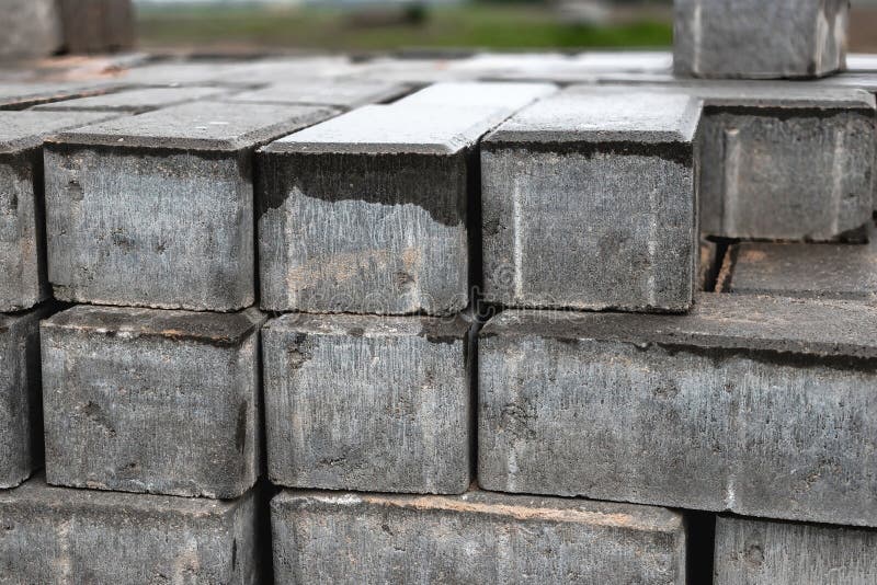 Cinder Blocks Stacked for Construction in a Building Site during Midday ...