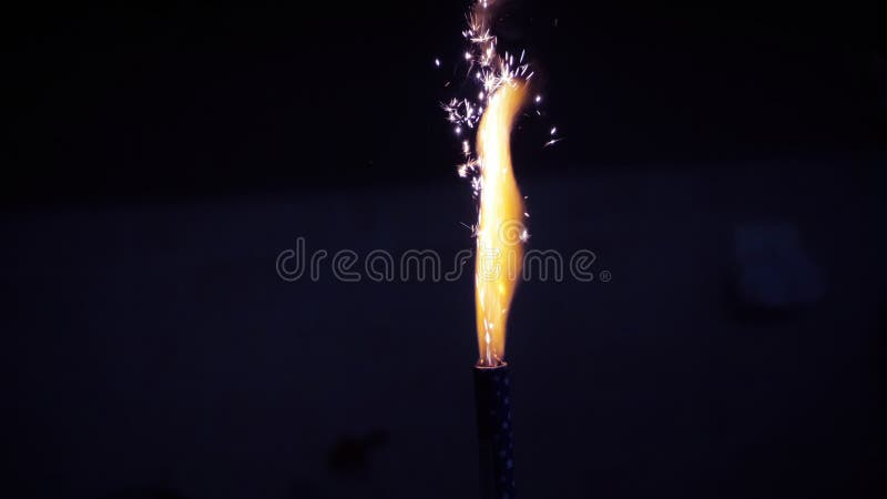 Cinemagraph of Sparks Exploding on Firework Candle in the Dark Stock ...