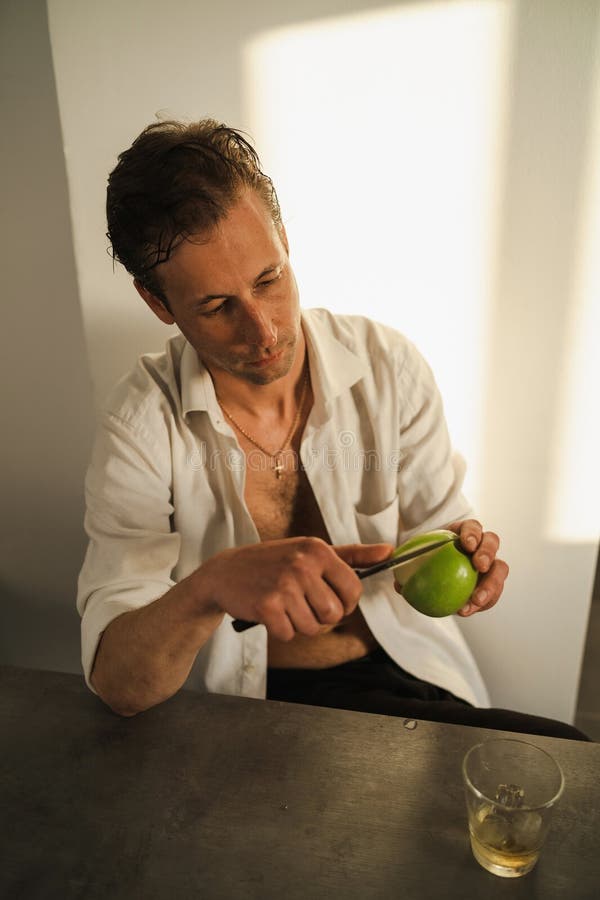 Portrait of Handsome Man Cutting and Eating Apple Stock Image - Image ...