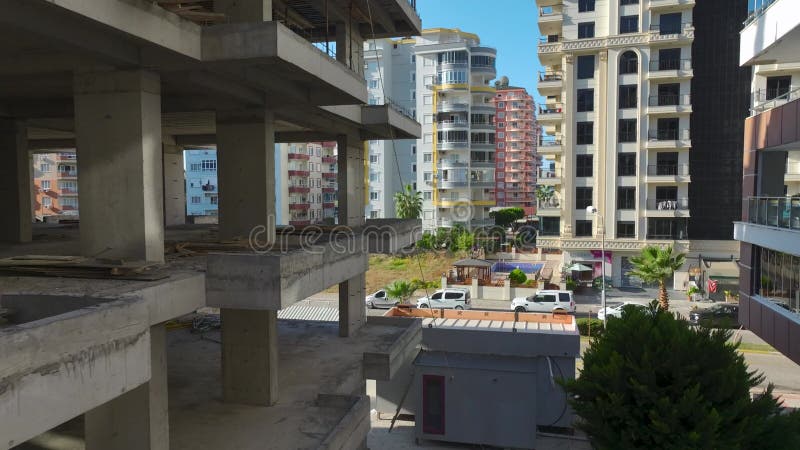 Aerial View: Crane Operator Skillfully Mounts Components while Scaling ...