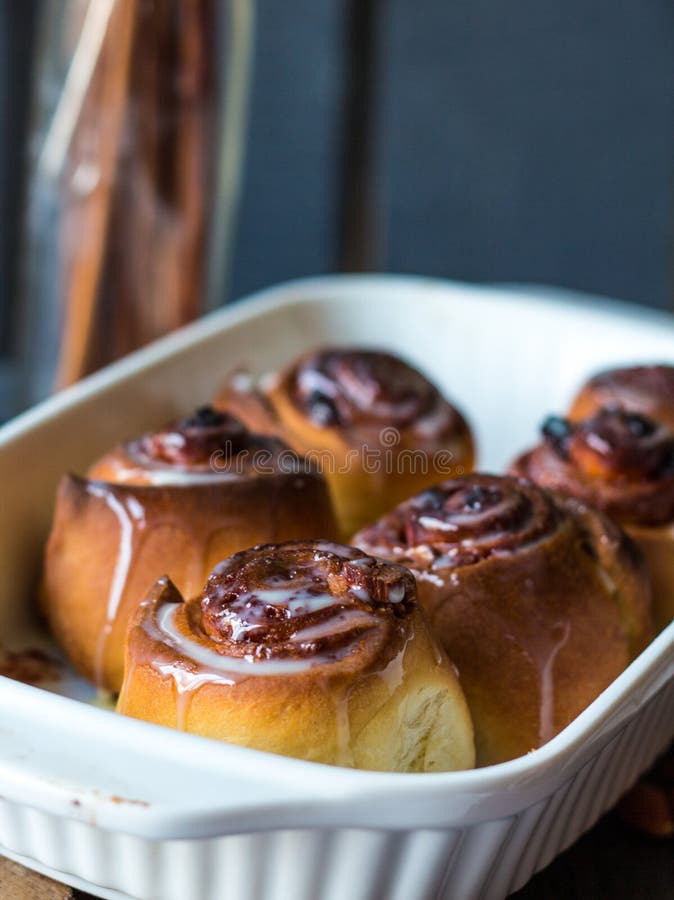 Cinnabon Cinnamon Rolls and Sauce in White Baking Dish Stock Image ...