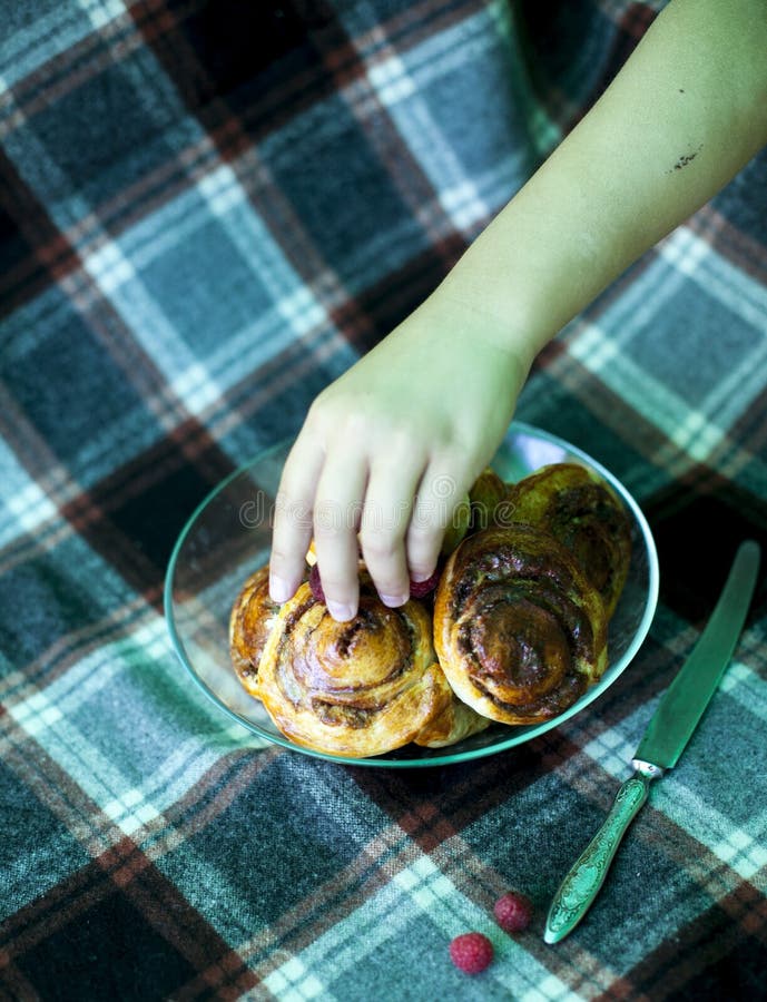 Cinnamon Buns Cooked at Home and Decorated with Raspberries Stock Image ...