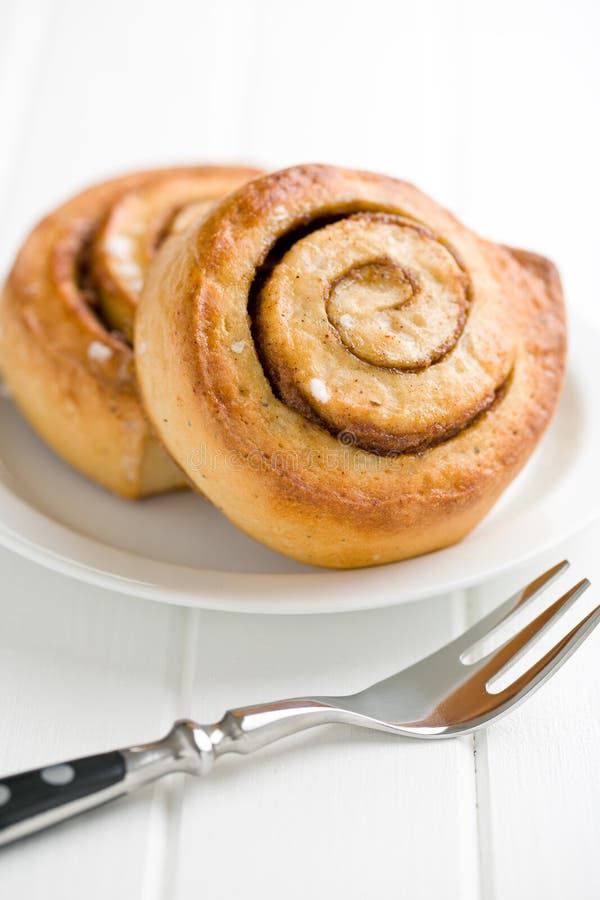 Cinnamon buns on plate stock image. Image of snack, cinnamon - 57278235