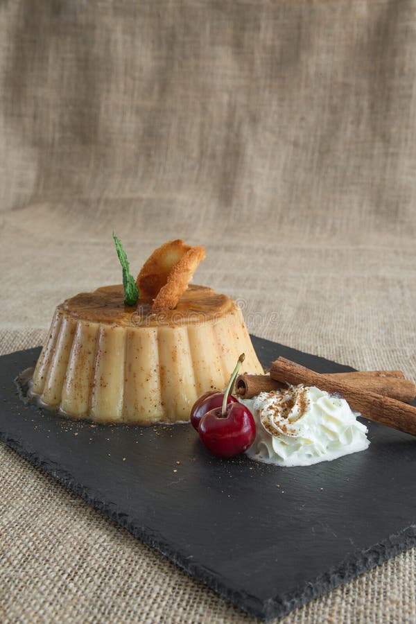 Cinnamon and caramel flan stock image. Image of plate - 55406387