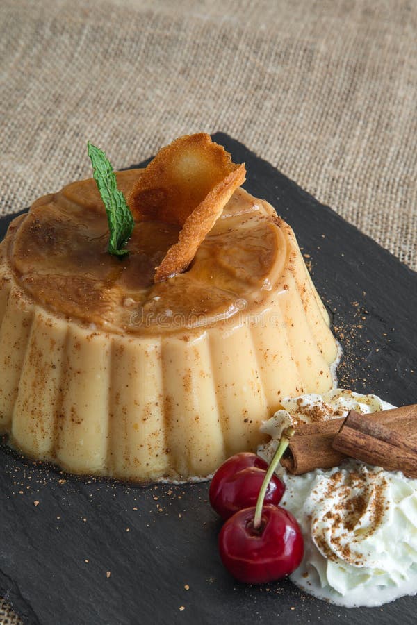 Cinnamon and caramel flan stock image. Image of dish - 55406509