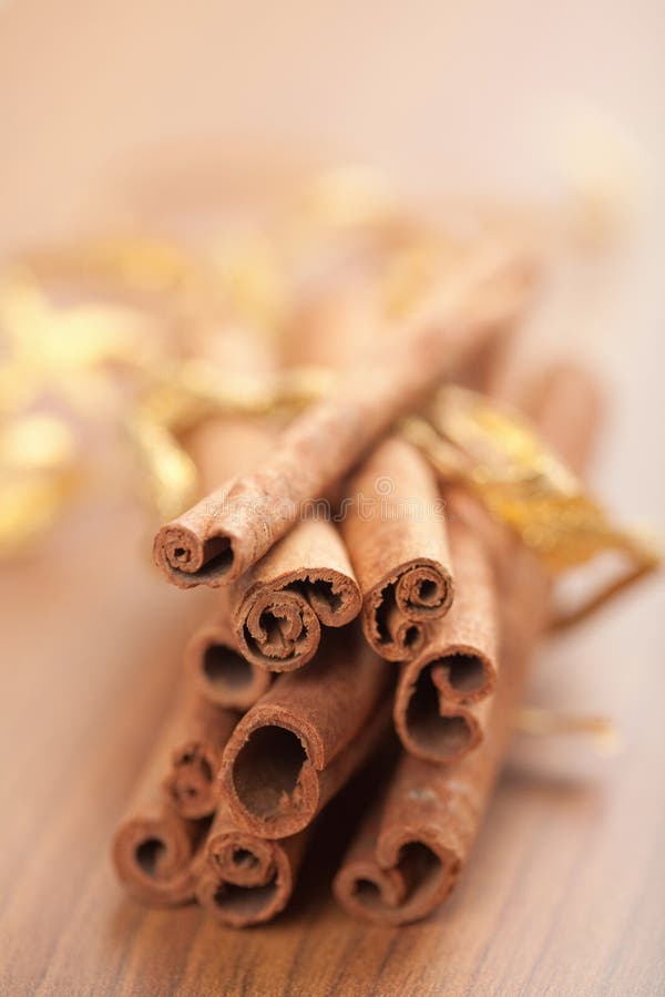 Cinnamon with Golden Ribbon Stock Photo - Image of cooking, aromatic ...