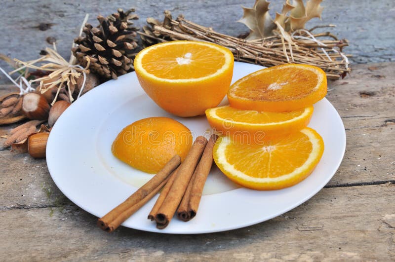 Cinnamon and orange stock image. Image of spice, plate - 27472149
