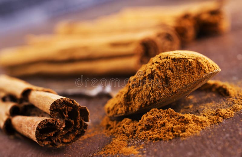 Cinnamon powder on a table stock photo. Image of plant - 388813088