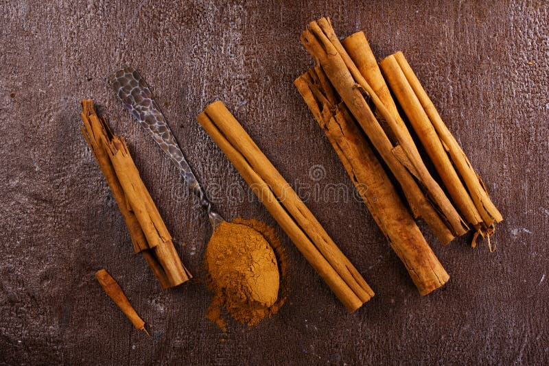 Cinnamon powder on a table stock image. Image of condiment - 388813115