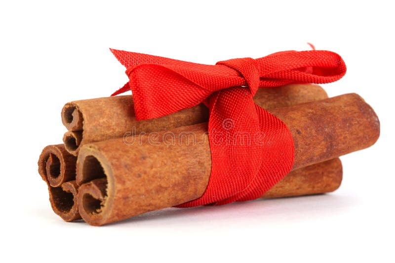 Cinnamon with red ribbon stock image. Image of brown - 16197457