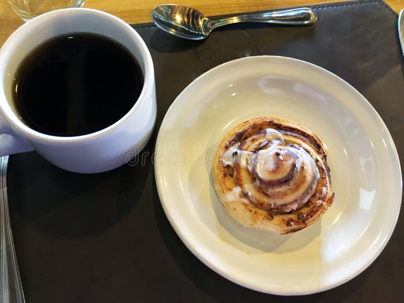 Cinnamon Roll and a Cup of Coffee Stock Image - Image of brown, morning ...