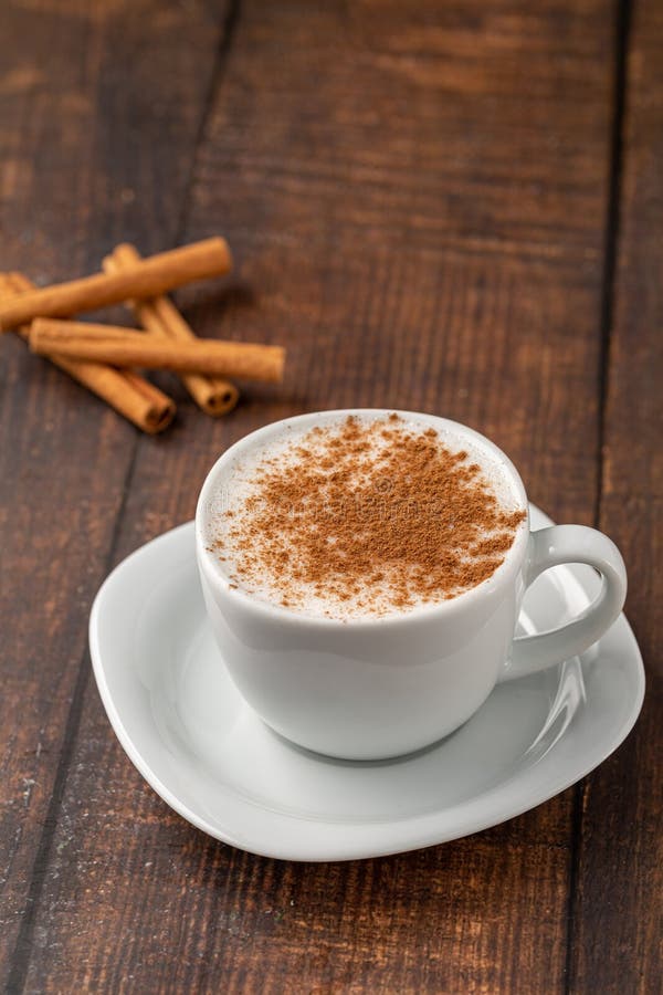 Cinnamon Sprinkled Salep in a White Cup on Wooden Table Stock Image ...