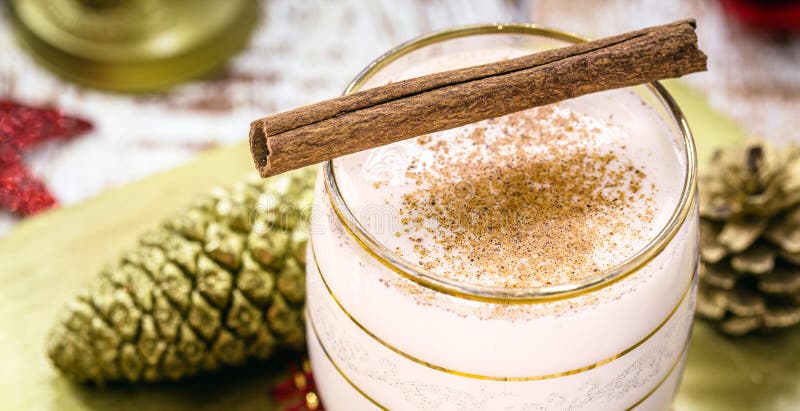 Cinnamon Stick Decorating Christmas Eggnog Glass, Spot Focus Stock ...