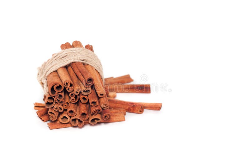 Cinnamon Sticks Bandaged with Rope on White Background . Stock Image ...