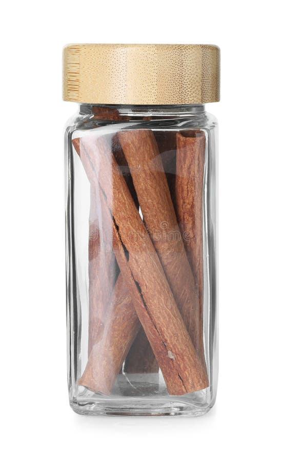 Cinnamon Sticks in Glass Jar Isolated on White Stock Photo - Image of ...