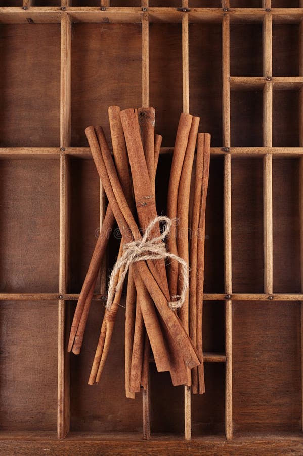 Cinnamon Sticks on Old Wooden Box Tied Stock Photo - Image of spice ...