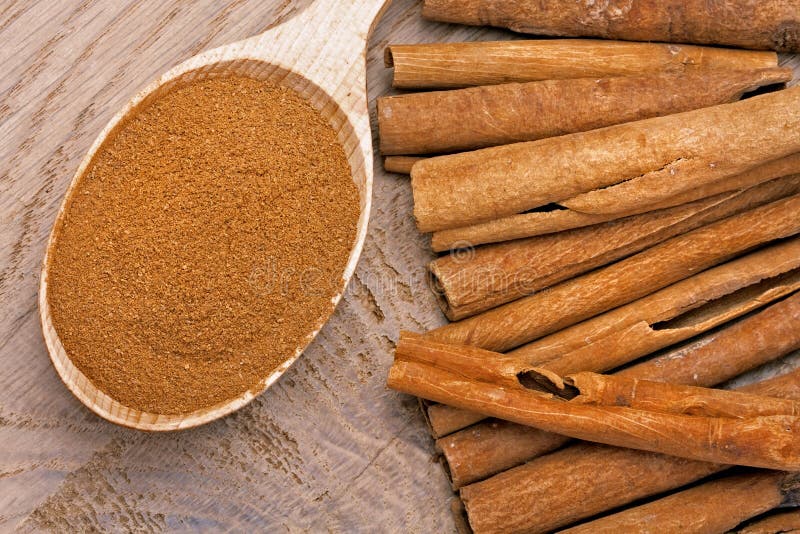 Cinnamon in Sticks and Powder Stock Photo - Image of delicacy, wood ...