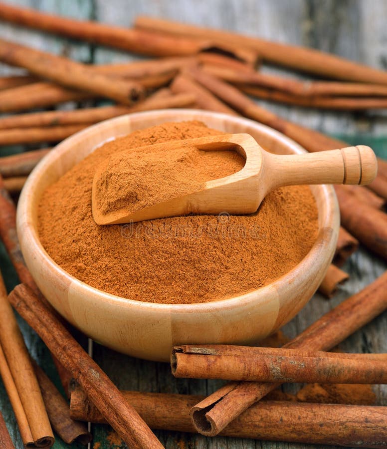 Cinnamon Sticks and Powder Cinnamon Stock Photo - Image of tied, sticks ...