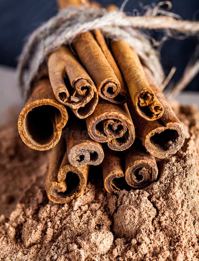 Cinnamon sticks on powder stock image. Image of dried - 78819419
