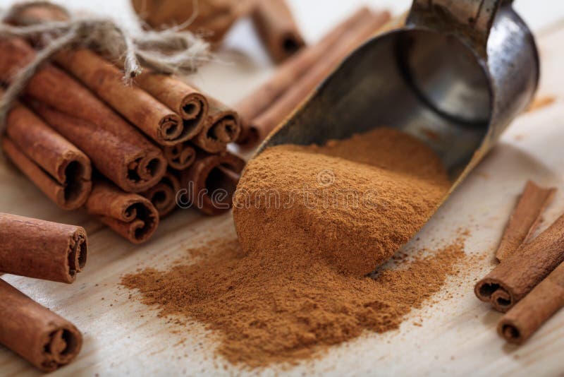 Cinnamon sticks and powder stock photo. Image of food - 74736258