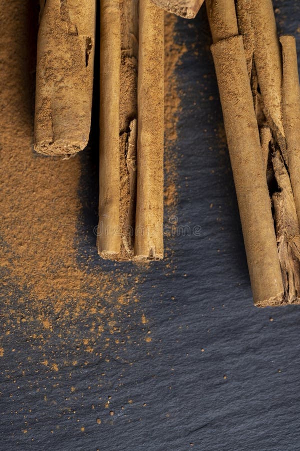 Cinnamon Tree Bark with Golden Powder Stock Image - Image of used, dark ...