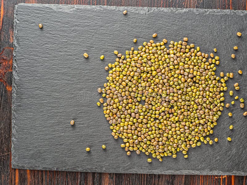 A Circle of Beans of Mung Bean Soybeans are on the Surface of the Slate ...