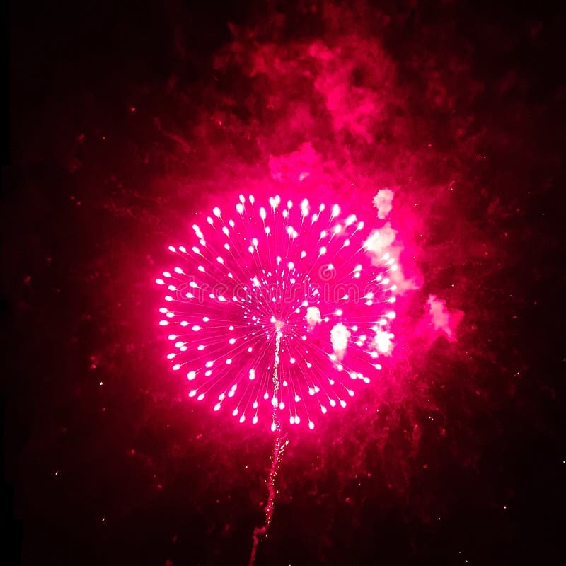 Circle Explosion of Festive Real Fireworks with Red Smoke on Black ...