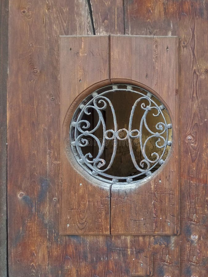 Circle Lattice Window on Wooden Door Stock Photo - Image of outdoor ...